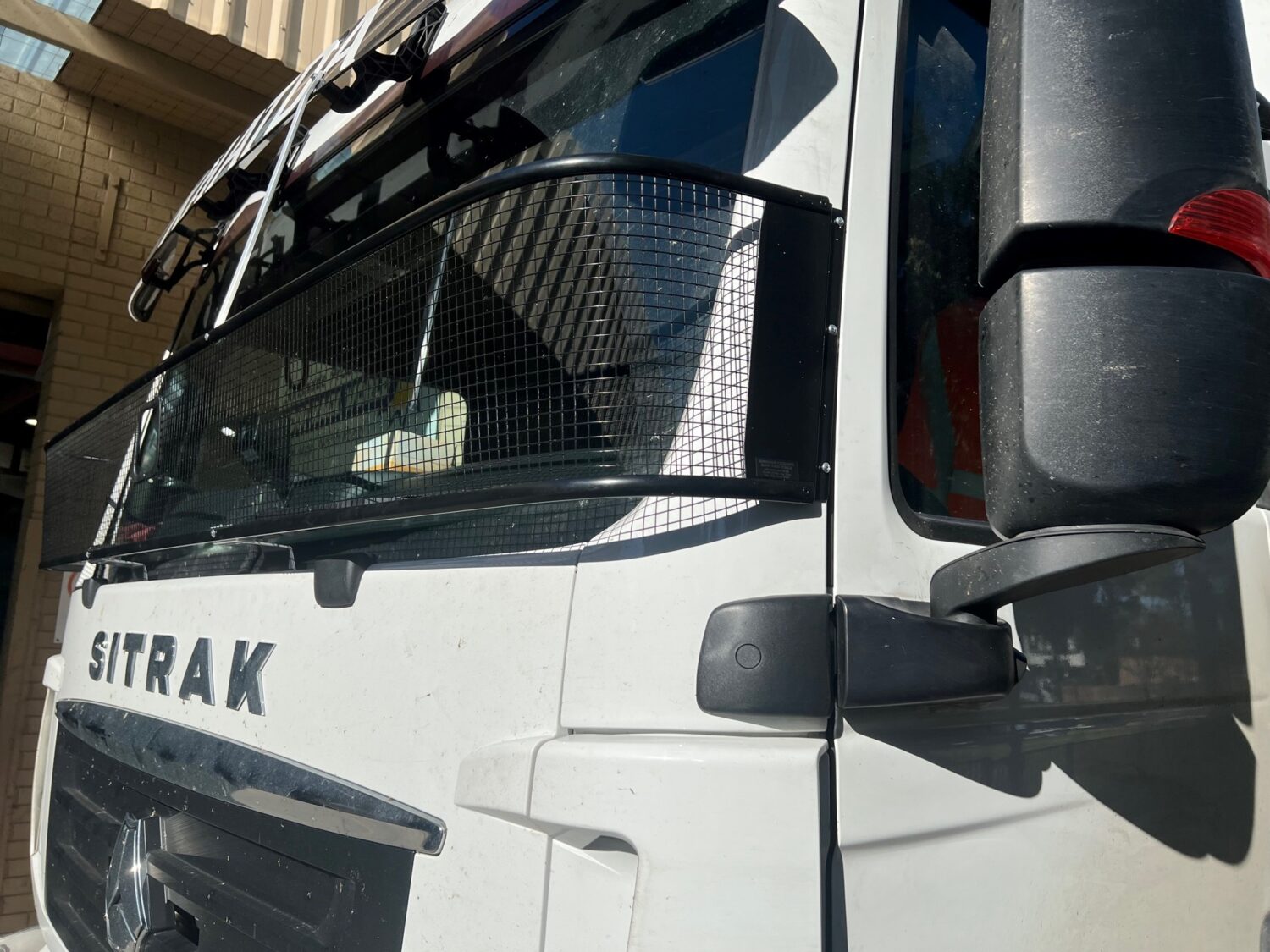 SinoTruck Sitrak 2022on Black Windscreen Stone Protector - Roof Rack World